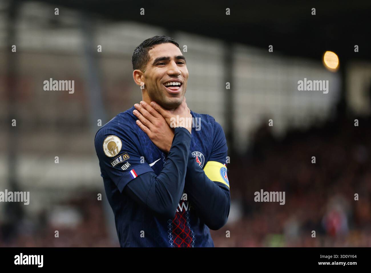PSG's Achraf Hakimi celebrates after scoring his side's second goal ...