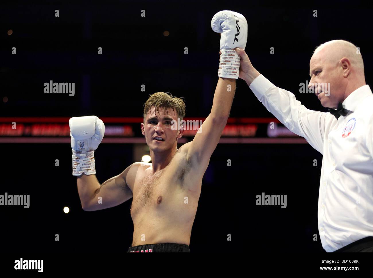 Jimmydean Wood (left) after winning the super welter weight bout ...