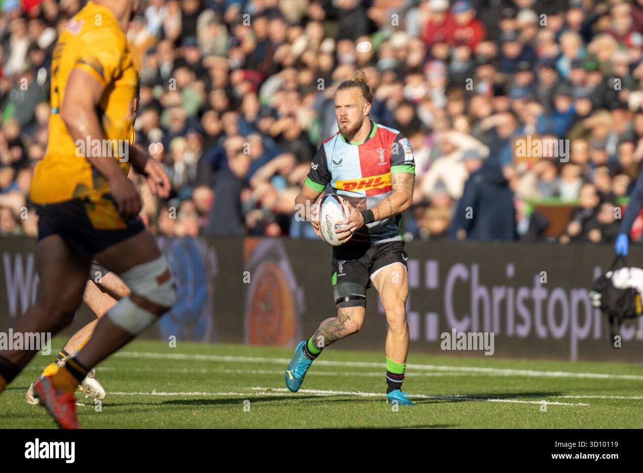 Tyrone Green (15 Harlequins) looks for space whilst attacking during ...