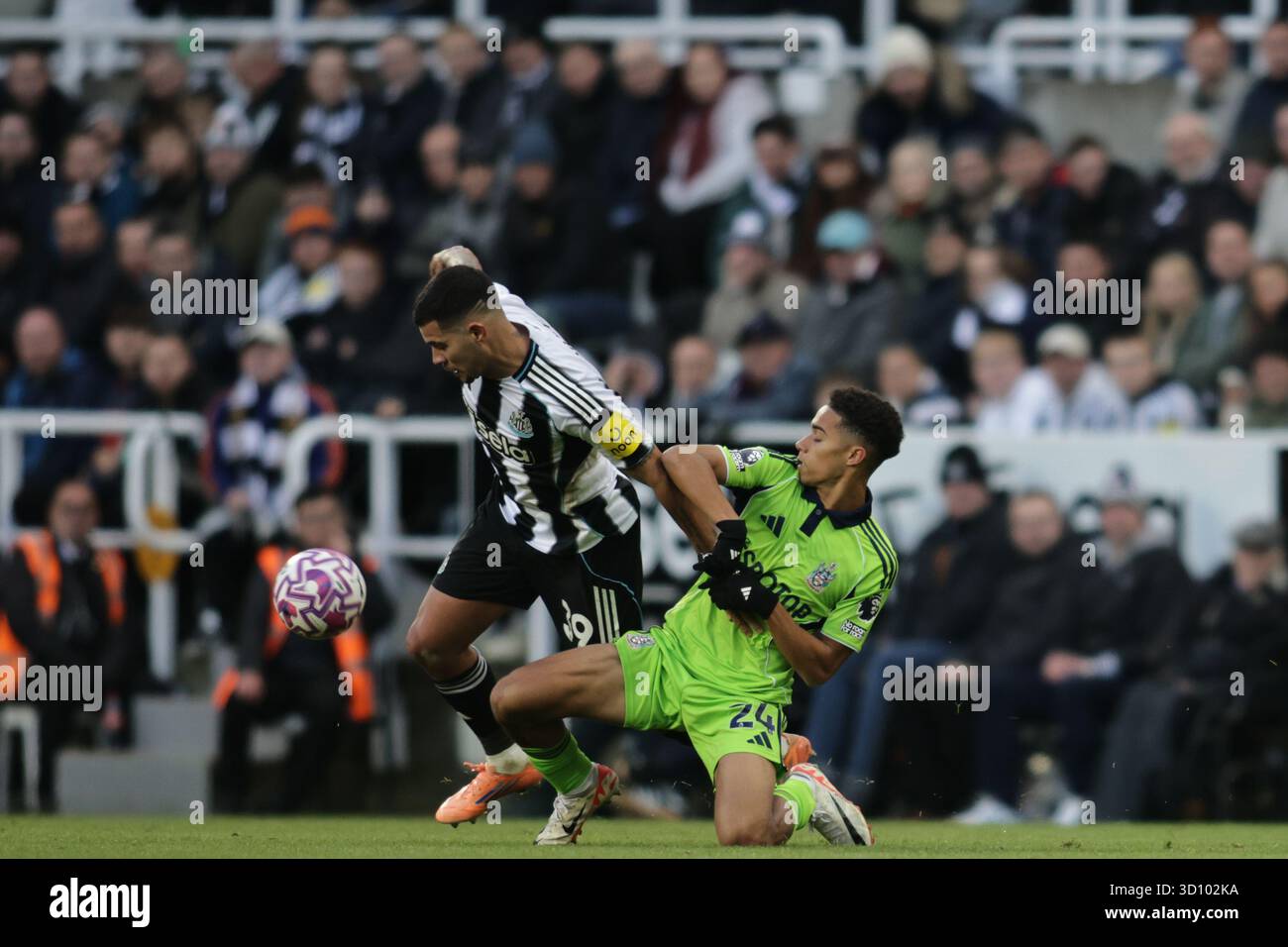 Joshua King of Fulham holds into Bruno Guimarães Of Newcastle United ...