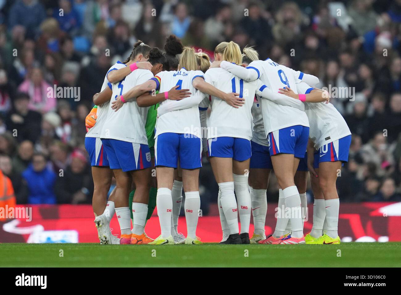England team huddles just prior to kick off of the international women ...