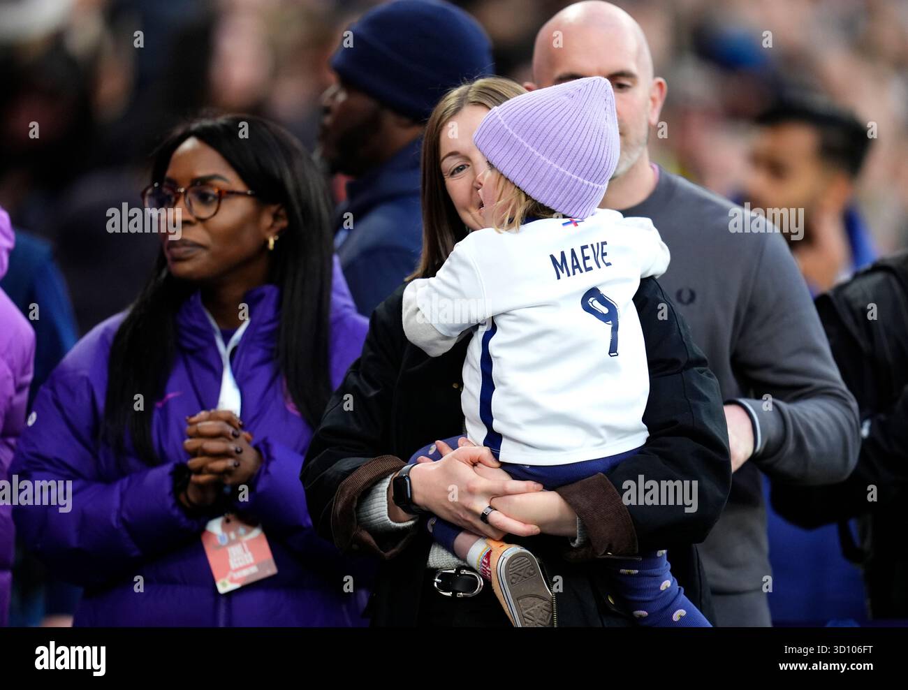 England's Ellen White and her daughter during the international ...