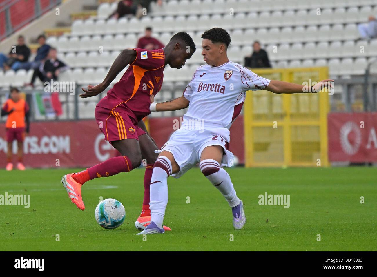 Mohammed Bah (AS Roma) battles for possession with Zalan Kugyala during ...