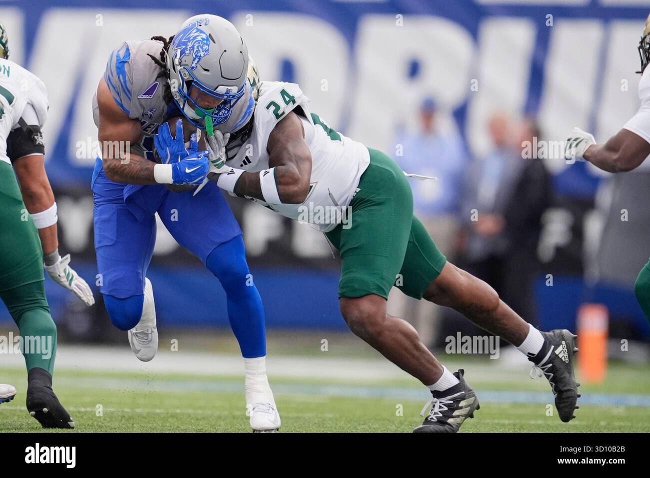 Memphis running back Sutton Smith (5) is tackled by South Florida ...