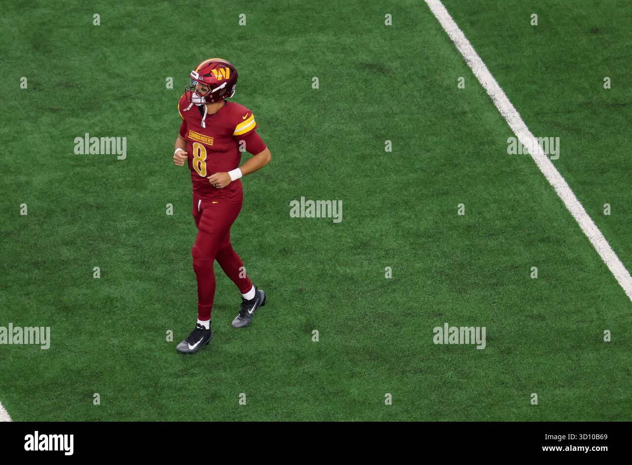 Washington Commanders quarterback Marcus Mariota (8) warms up before an ...