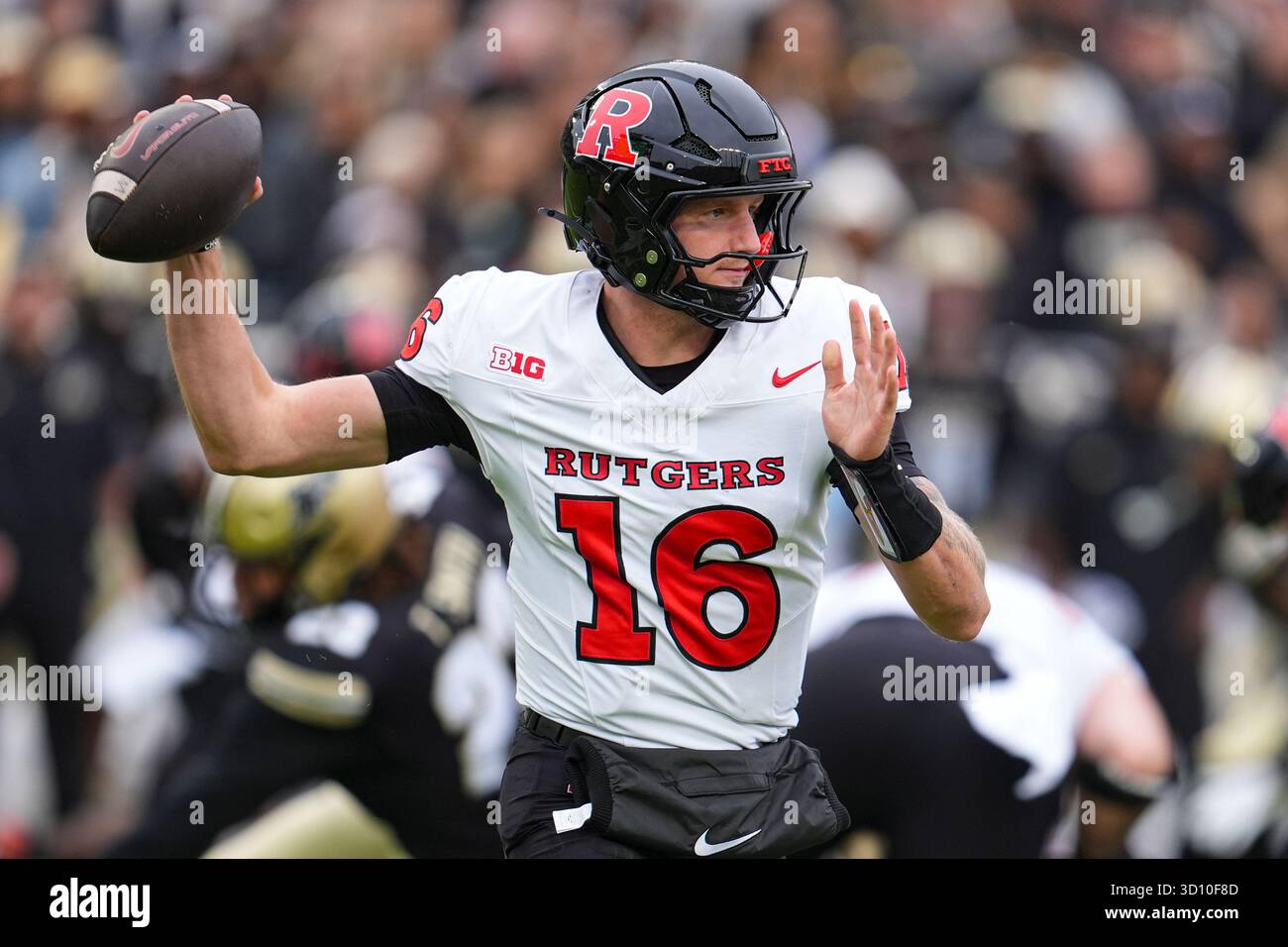 Rutgers quarterback Athan Kaliakmanis (16) throws against Purdue during ...