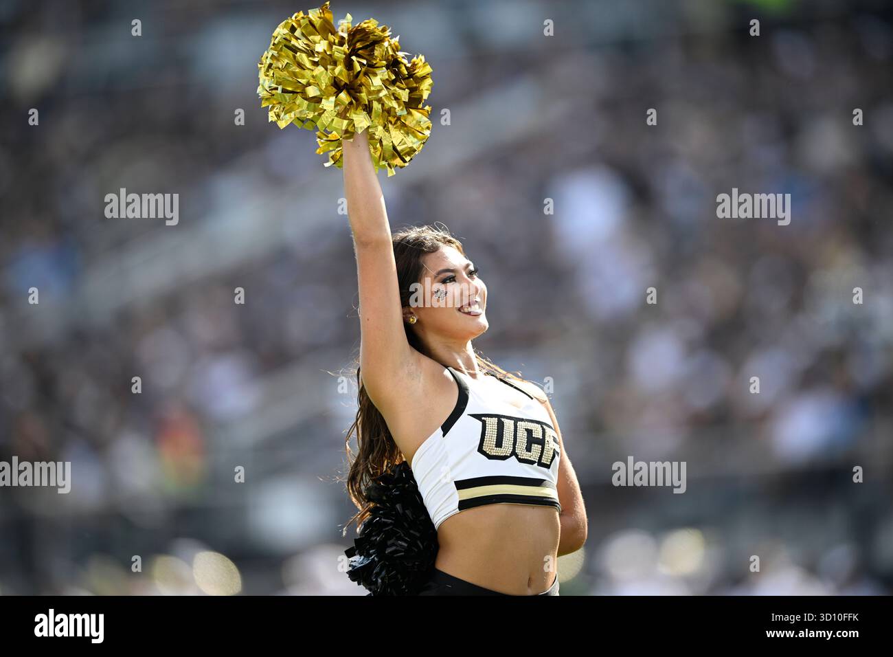 Central Florida dance team members perform on the field during the ...