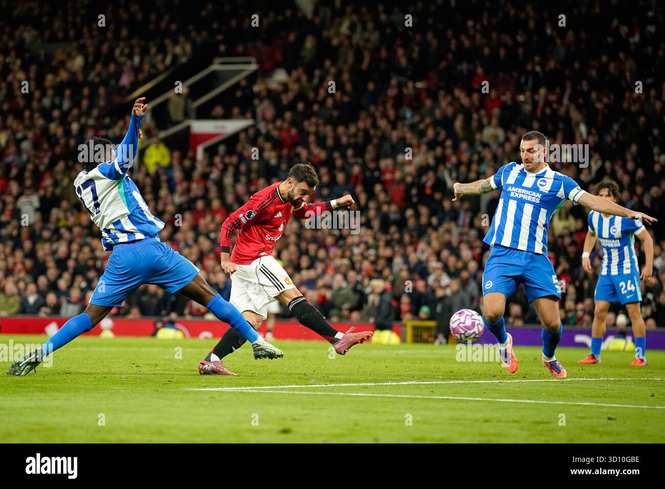 Manchester United's Bruno Fernandes, center, misses a chance during the ...