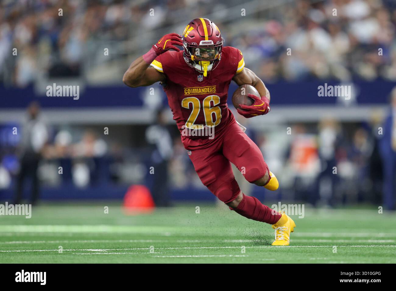 Washington Commanders running back Jeremy McNichols (26) rushes during ...