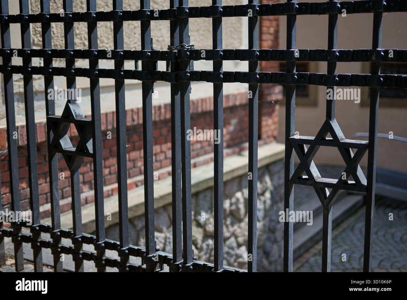 Synagogue entrance with iron gate with Star of David symbols Stock ...