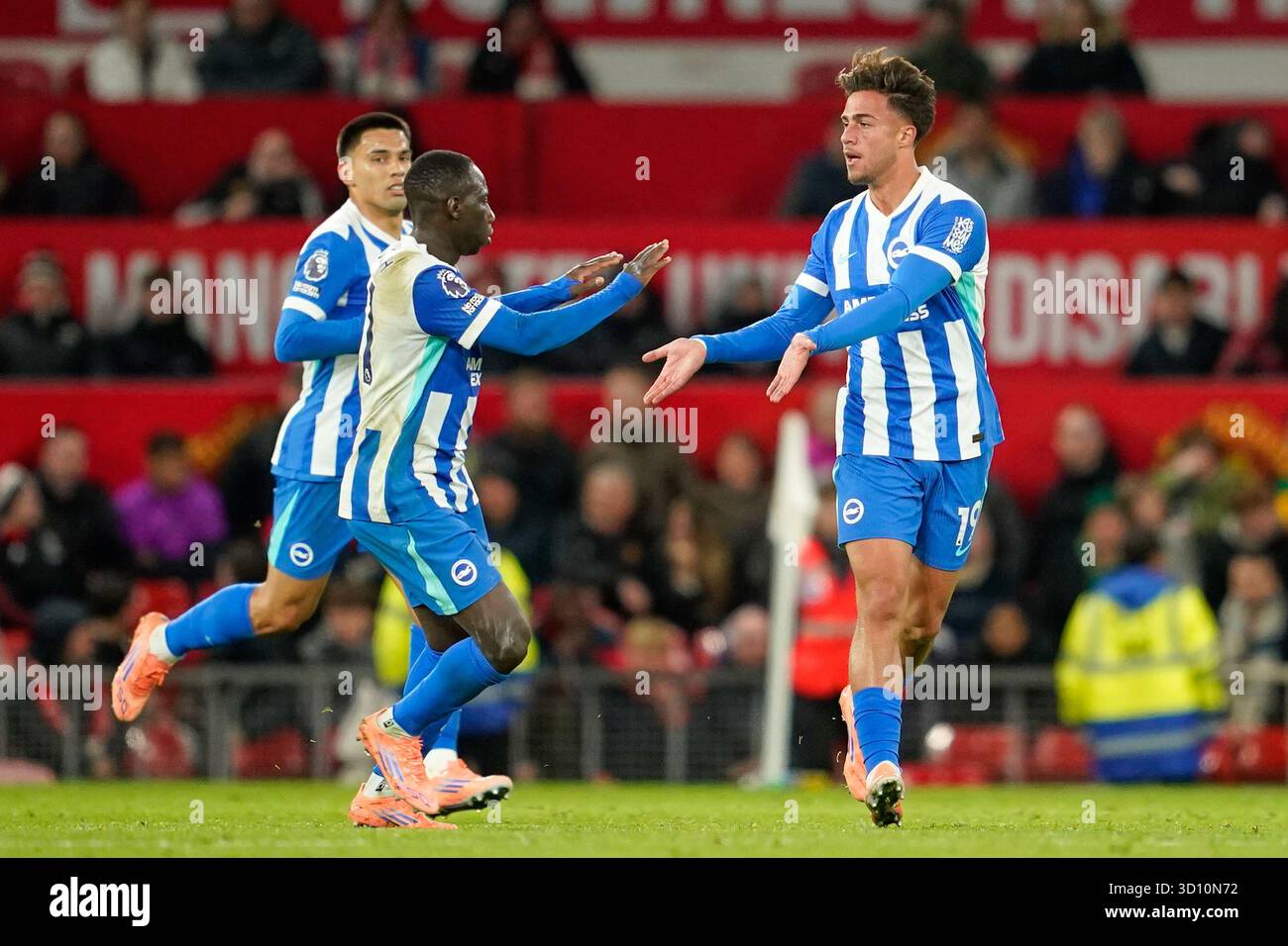 Brighton's Charalampos Kostoulas, right, celebrates after scoring his ...