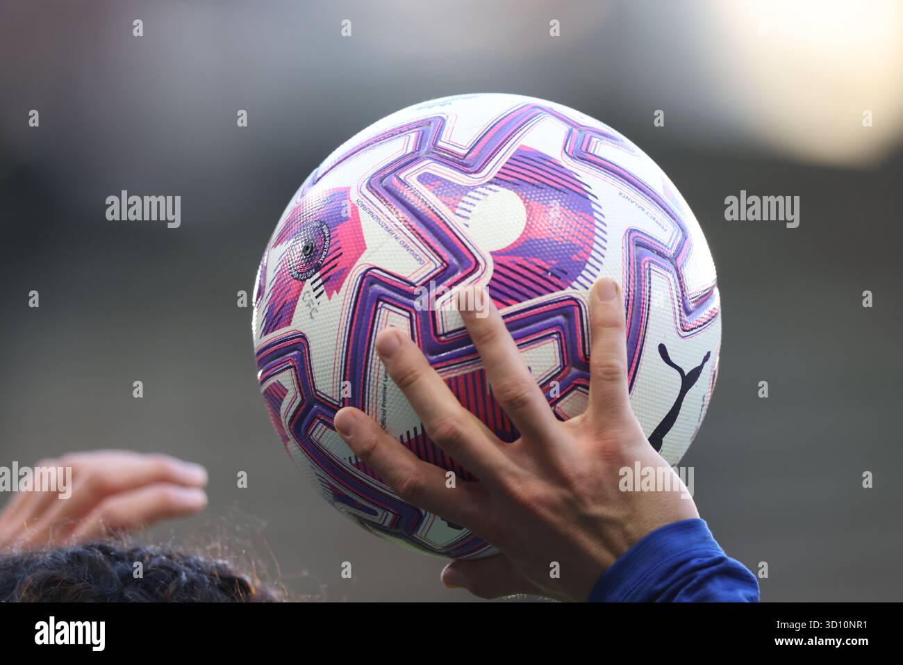 Marc Cucurella (C) holds the Puma matchball at the Chelsea v Sunderland ...