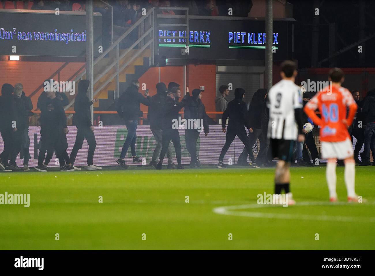 VOLENDAM, NETHERLANDS - OCTOBER 25: fans FC Volendam invading the field ...