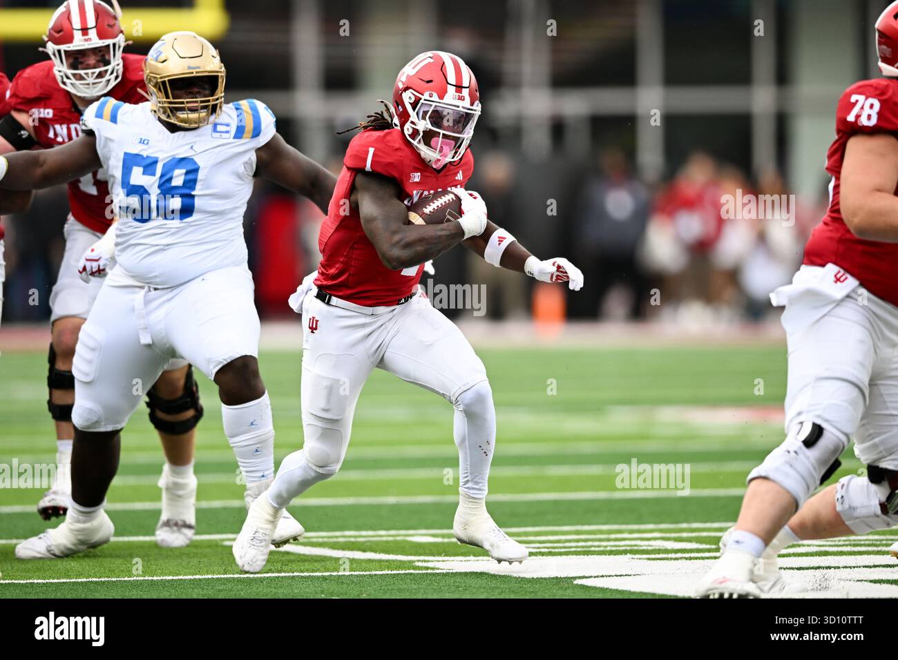 BLOOMINGTON, IN - OCTOBER 25: Indiana Hoosiers RB Roman Hemby (1) runs ...