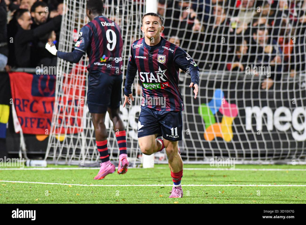 Liege's Alexis Lefebvre celebrates after scoring during a soccer game ...