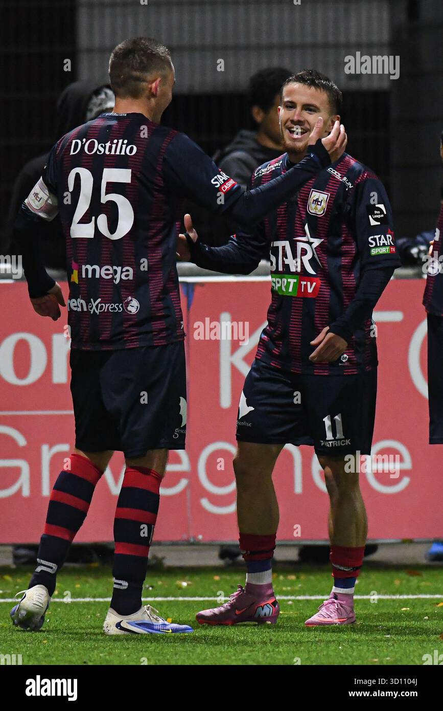 Liege's Alexis Lefebvre celebrates after scoring during a soccer game ...