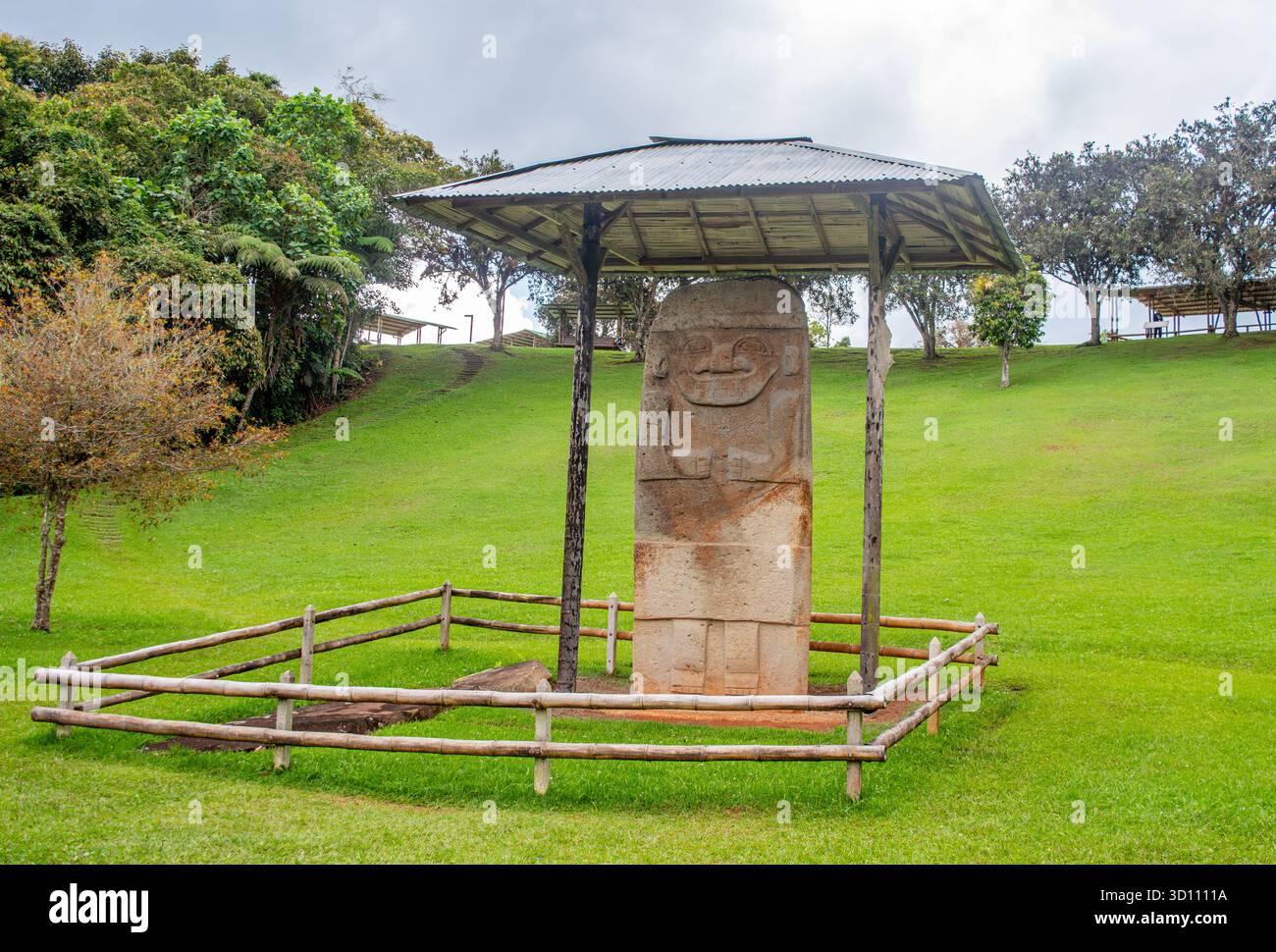A stunning view of a stone statue under a roof in San Agustin ...
