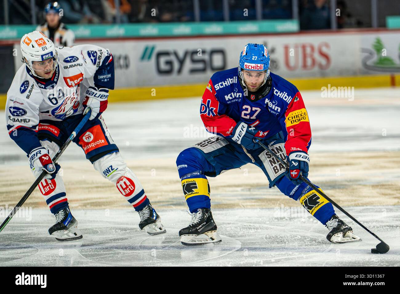 Kloten, Switzerland, October 25 2025: Pontus Aberg and Deniss Smirnovs ...