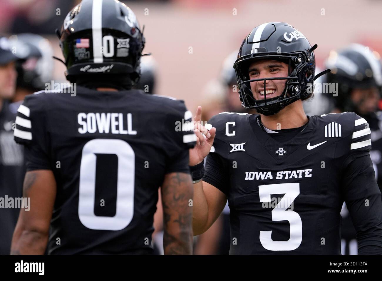 Iowa State quarterback Rocco Becht laughs with wide receiver Chase ...