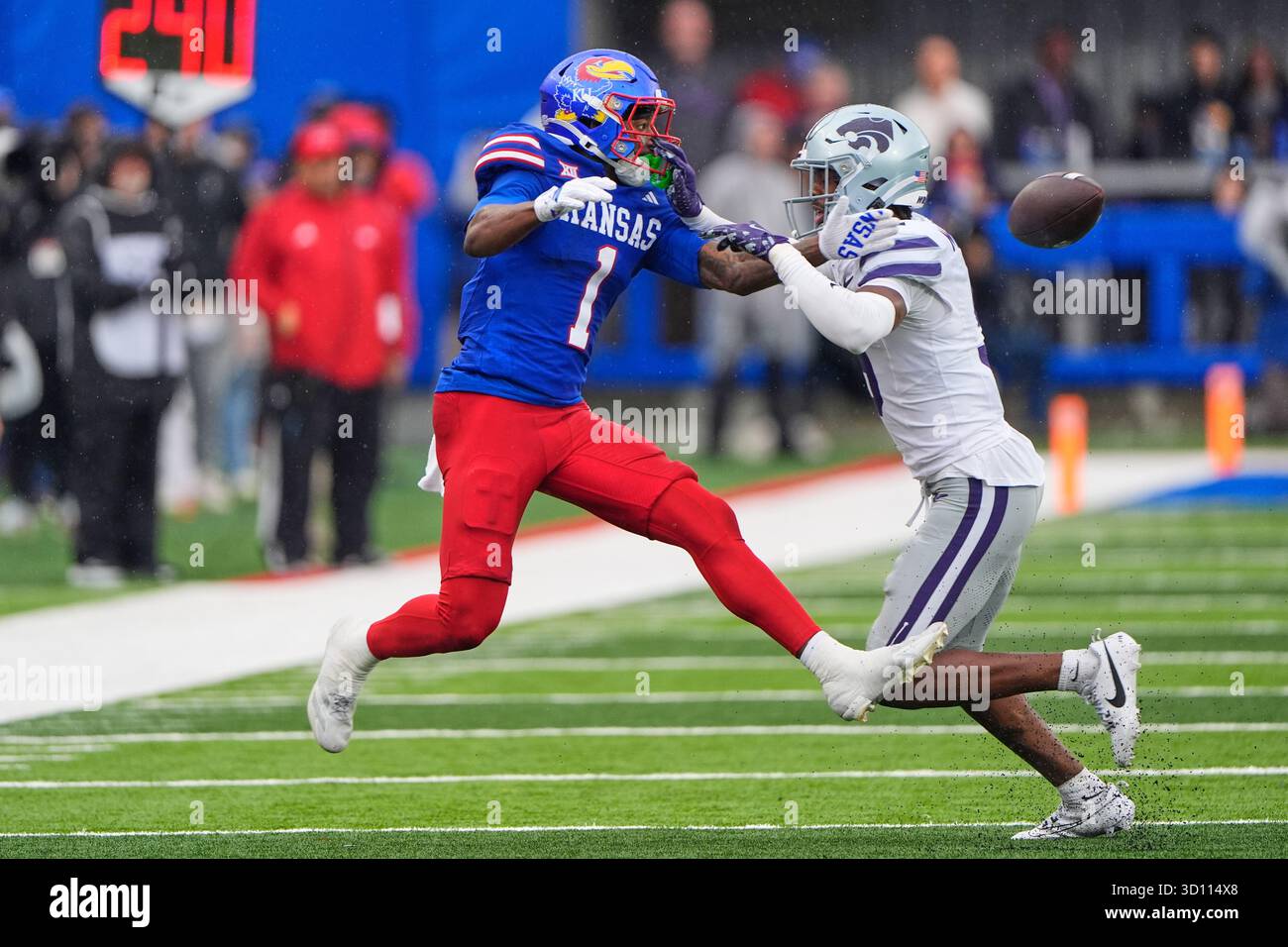 Kansas State cornerback Donovan McIntosh, right, breaks up a pass ...