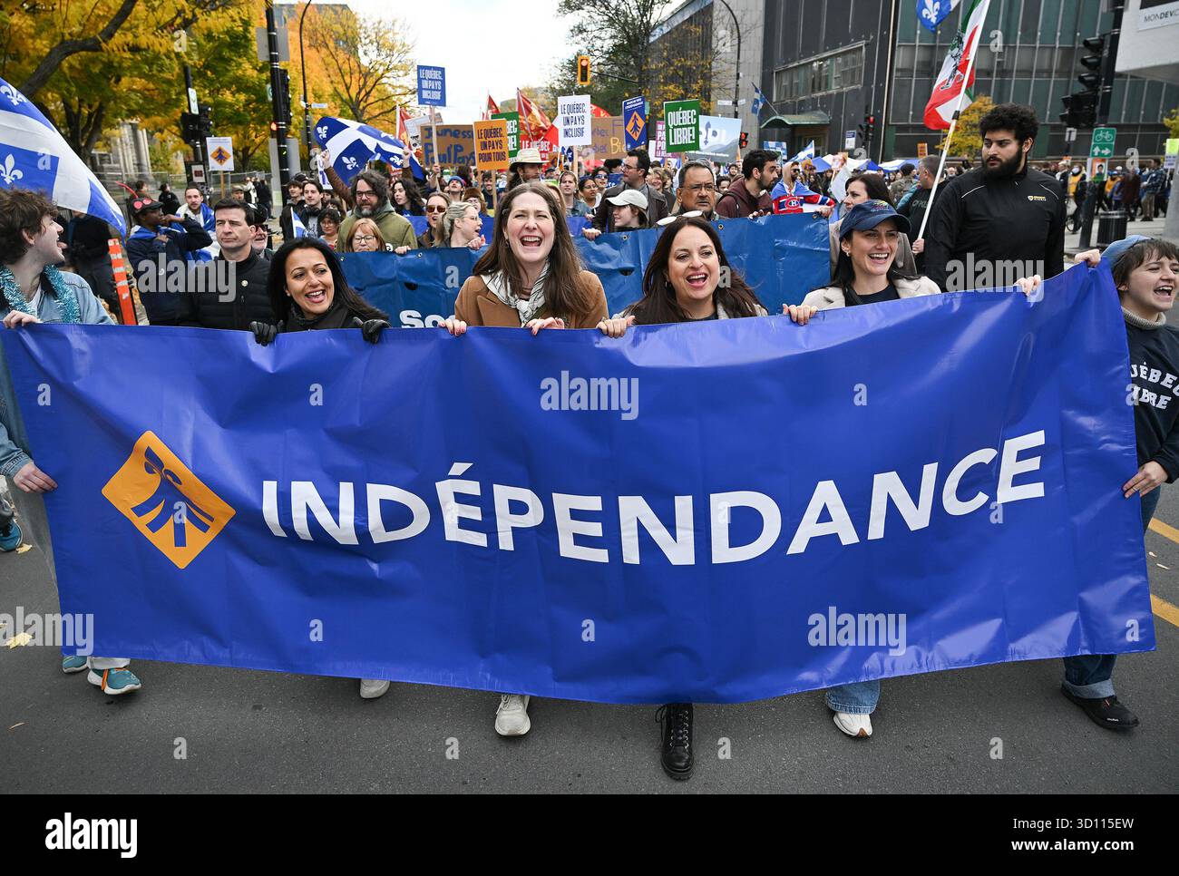 People participate in an independence march in Montreal, Saturday, Oct ...