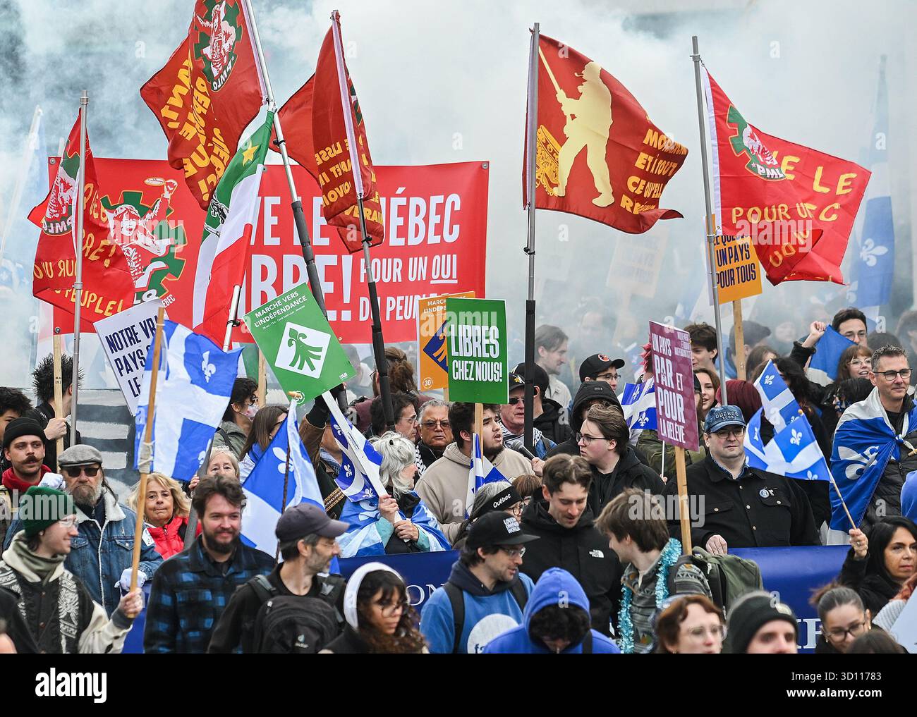 People participate in an independence march in Montreal, Saturday, Oct ...