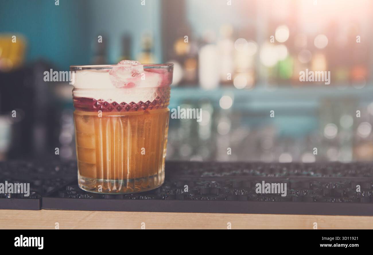 Creative cocktail in night club bar background Stock Photo - Alamy