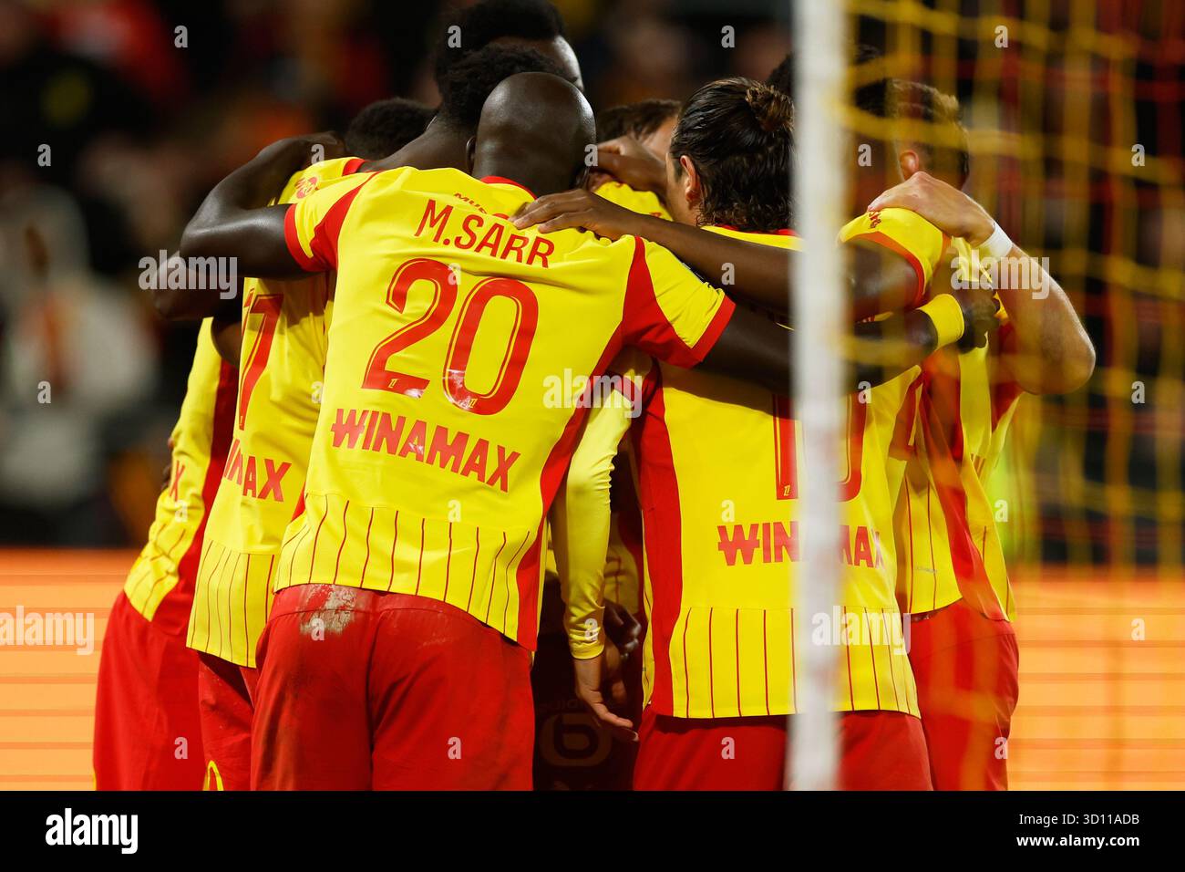 Players of Lens celebrate their side second goal during the French ...