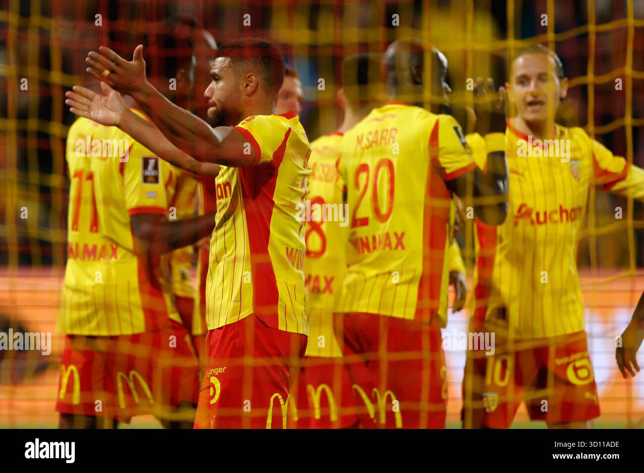 Players of Lens celebrate their side second goal during the French ...