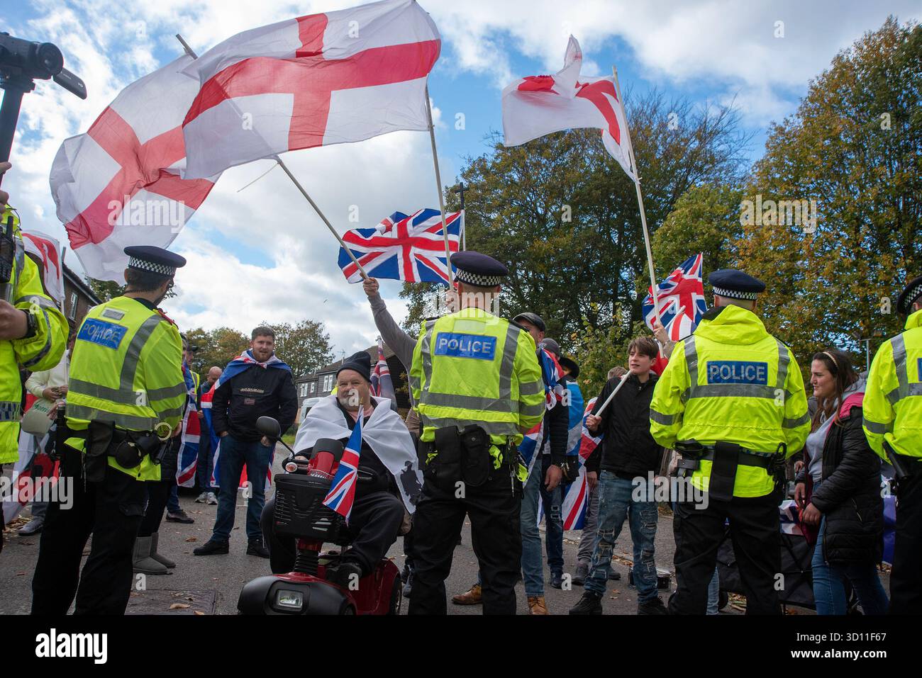 Protesters wave St. George's flags during the demonstration outside the ...