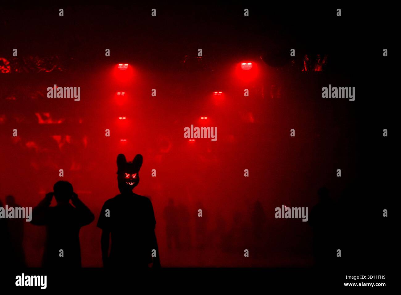 People dance during a Halloween rave in Kyiv, Ukraine, Saturday, Oct ...