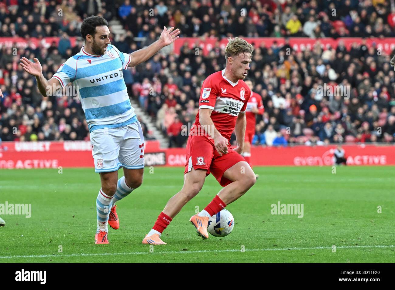 Tommy Conway of Middlesbrough drives forward with the ball during the ...