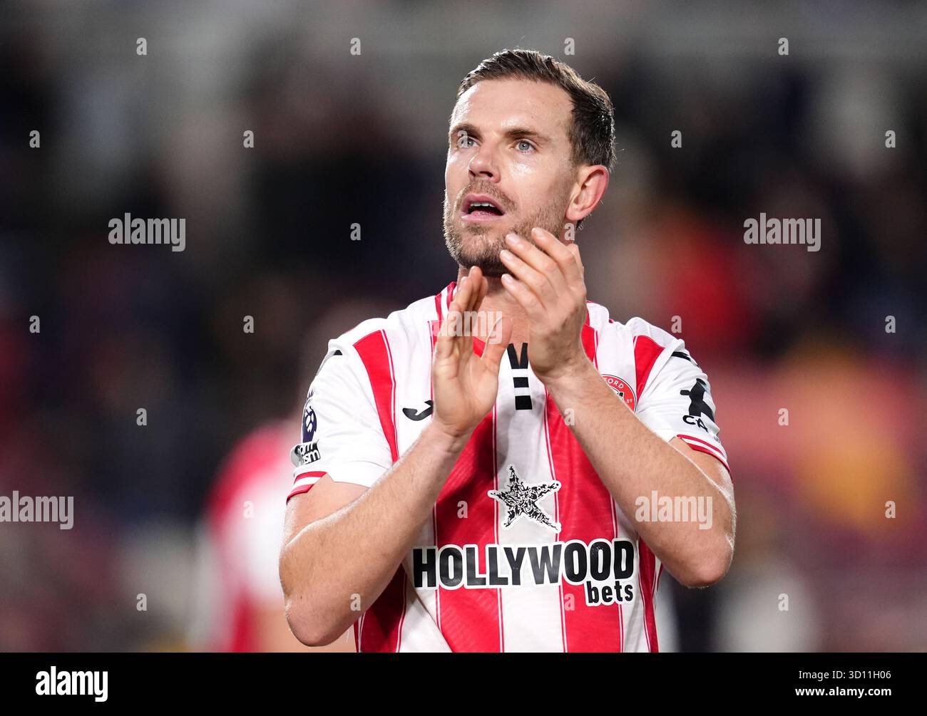 Brentford's Jordan Henderson applauds the fans following the Premier ...