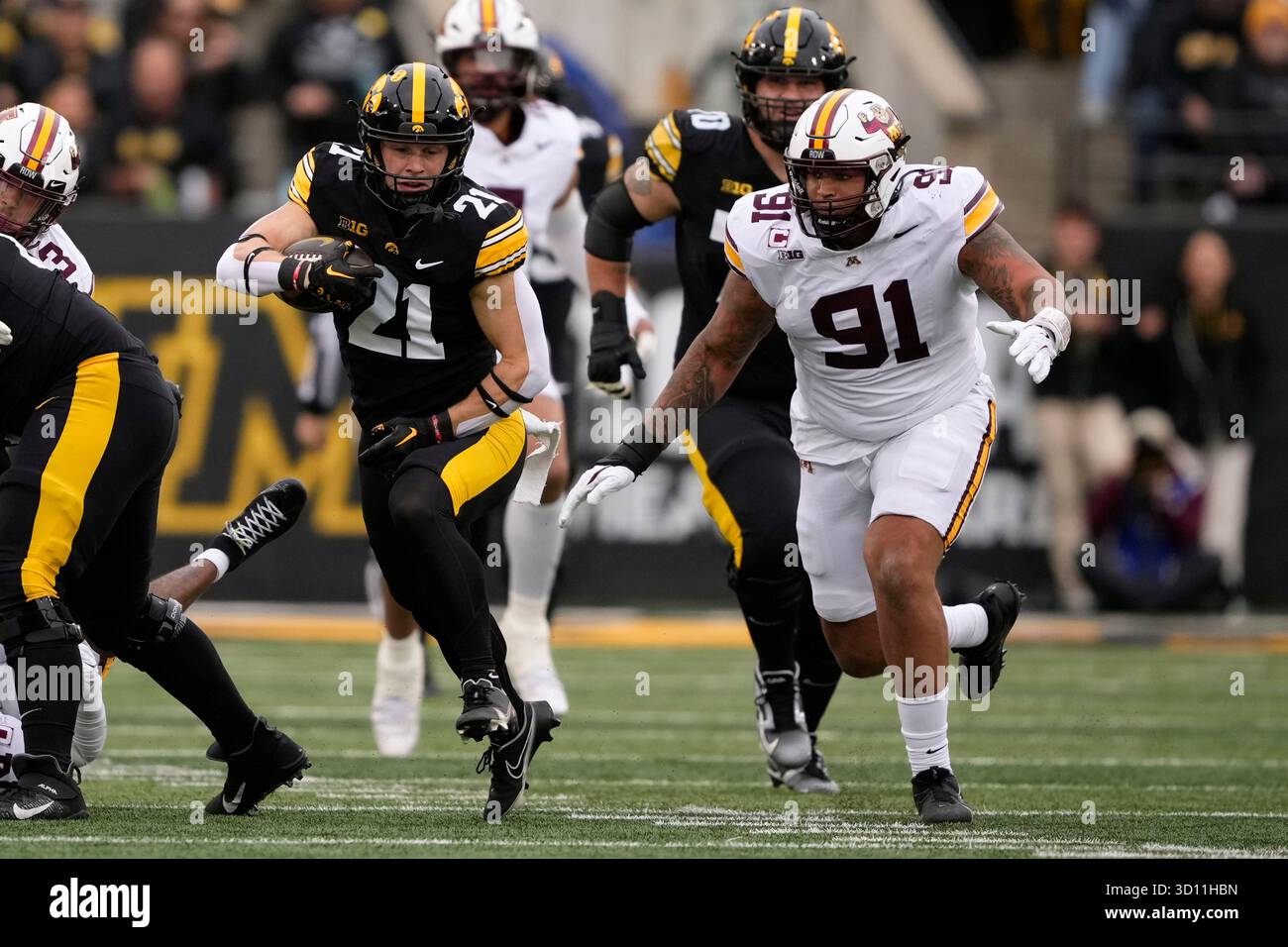 Iowa wide receiver Kaden Wetjen (21) runs from Minnesota defensive ...