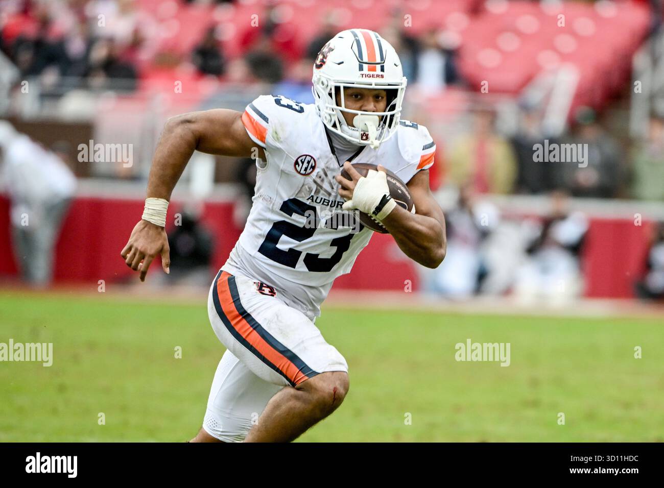 Auburn running back Jeremiah Cobb (23) runs for a big gain against ...