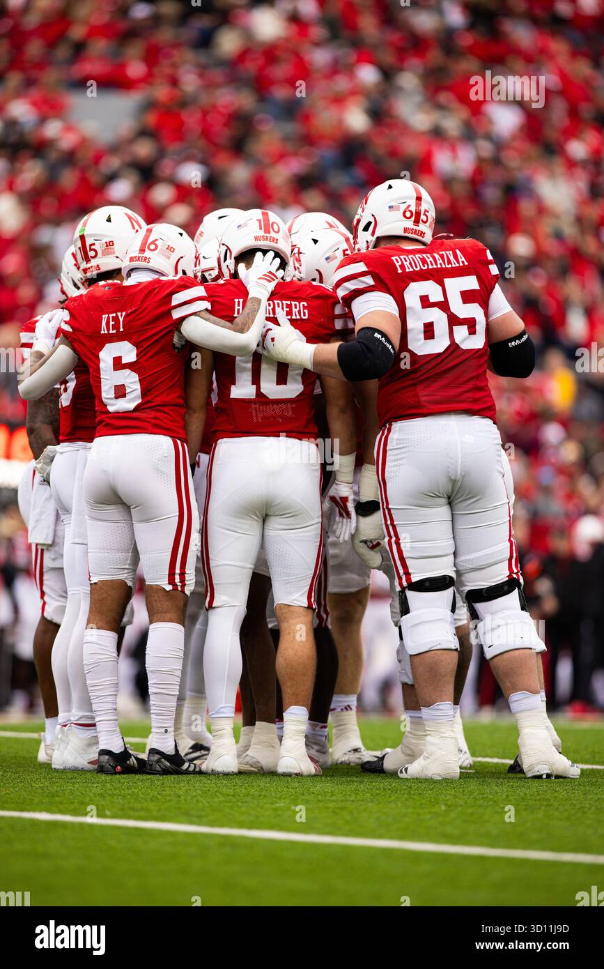LINCOLN, NE - OCTOBER 25: A Nebraska players huddle before an offensive ...