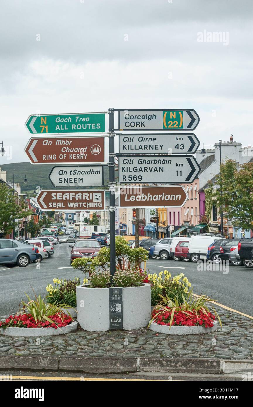 Bilingual road signs in both Gaelic and English grouped on a pole in ...