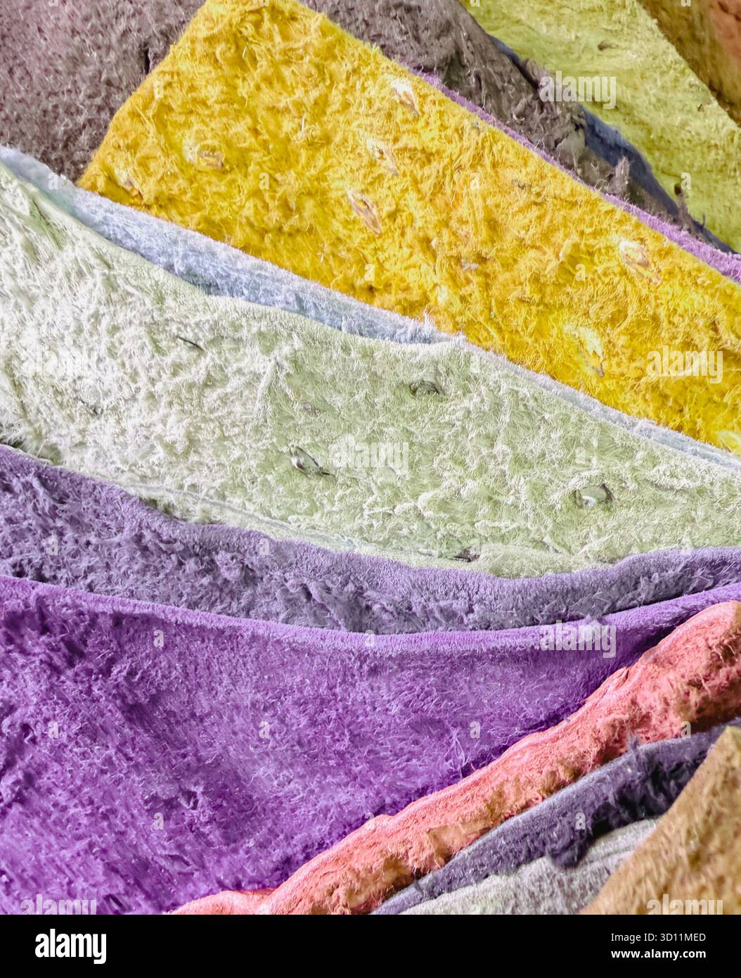 Fabric swatches with color variations in rough leather fabric. Lines ...