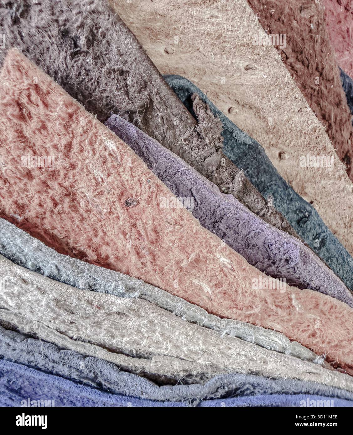 Fabric swatches with color variations in rough leather fabric. Lines ...
