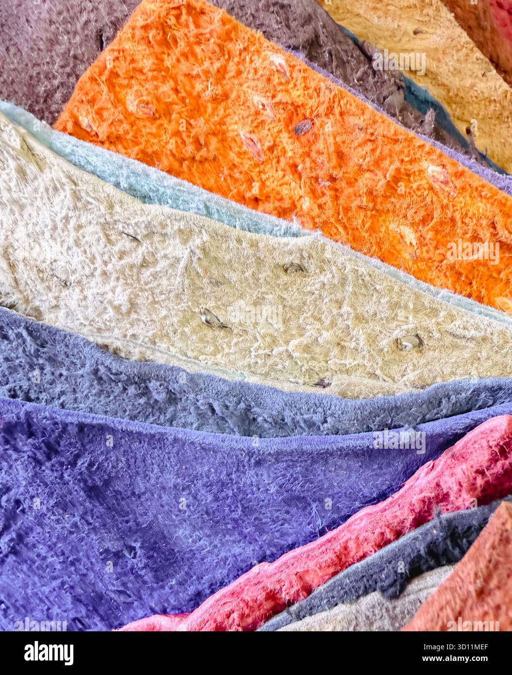 Fabric swatches with color variations in rough leather fabric. Lines ...