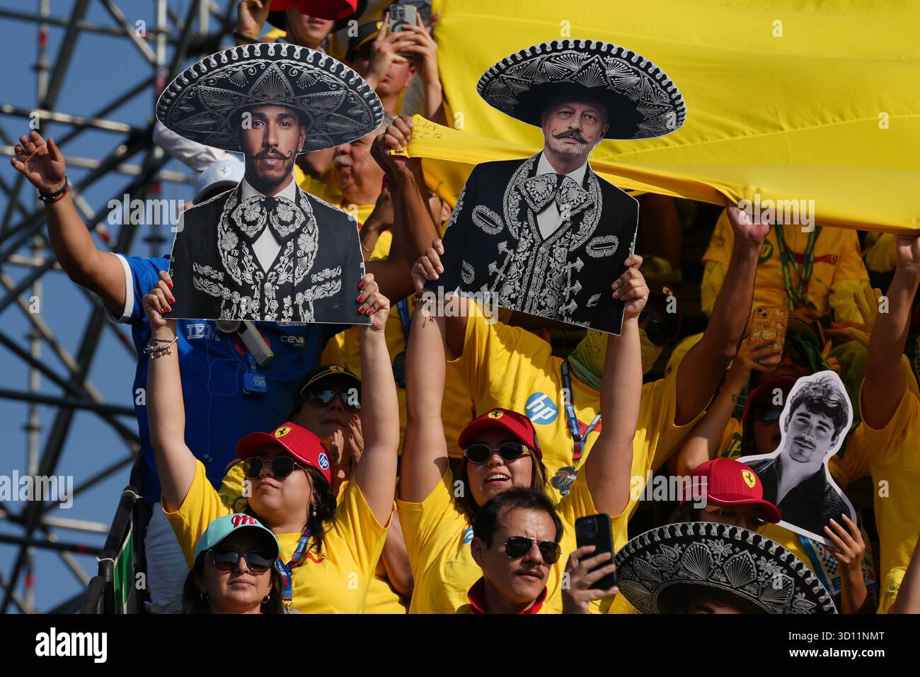 Ferrari fans cheer during the qualifying session for Formula One Mexico ...