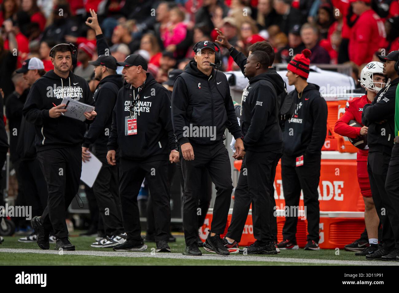 Cincinnati head coach Scott Satterfield walks down the field during the ...