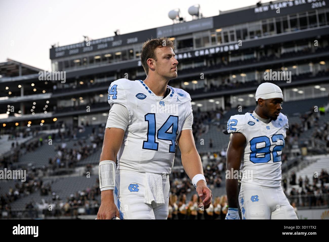 North Carolina quarterback Max Johnson (14) and receiver Nathan Leacock ...