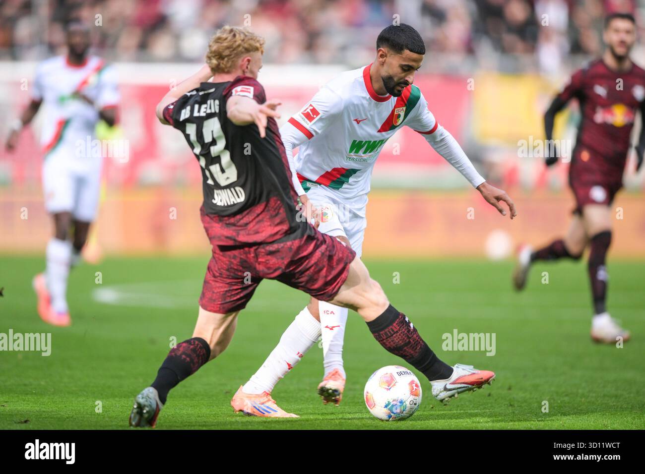 from left: Nicolas Seiwald (Leipzig), Elias Saad FC Augsburg, October ...