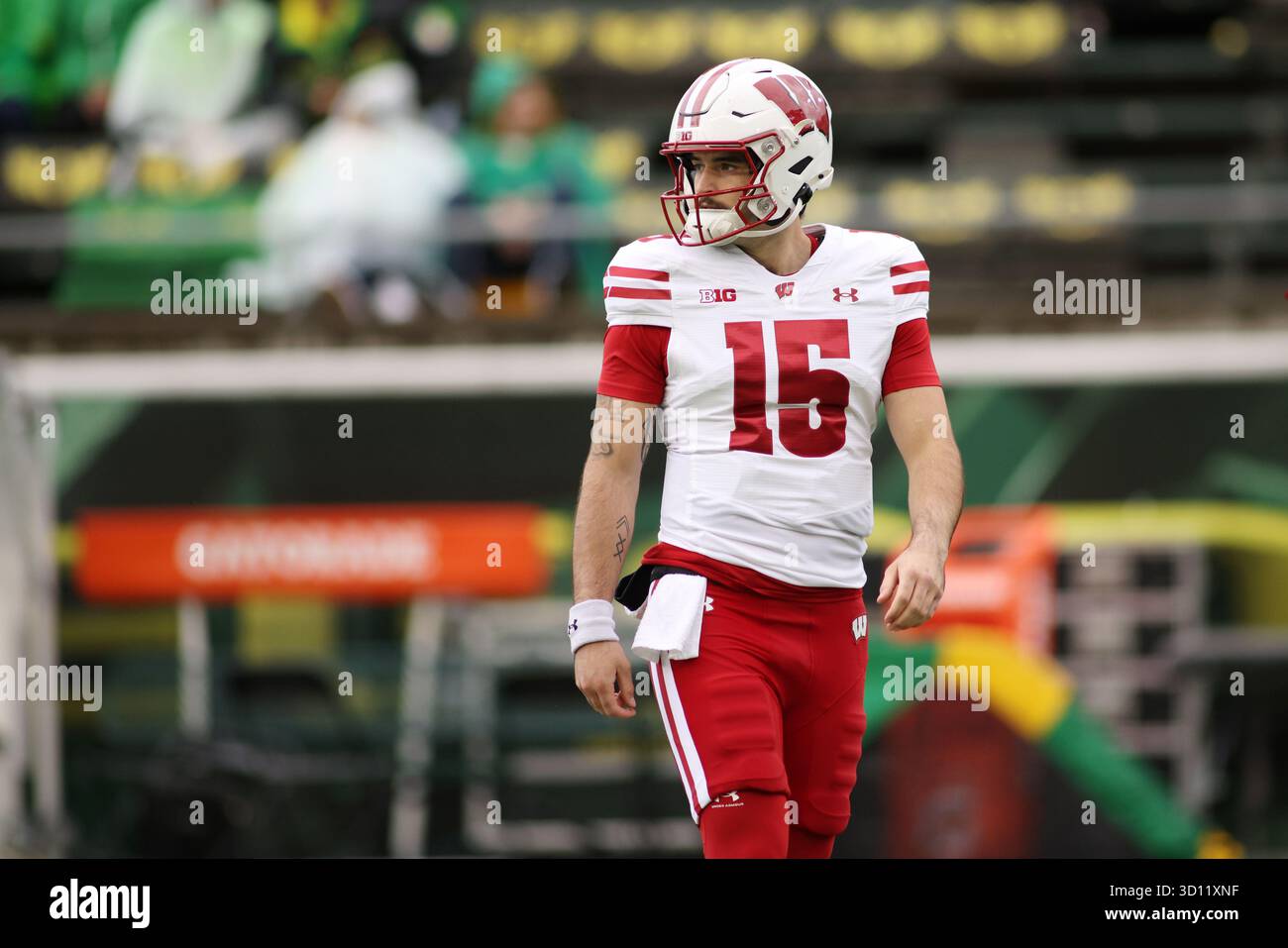 Wisconsin quarterback Hunter Simmons looks on before an NCAA college ...