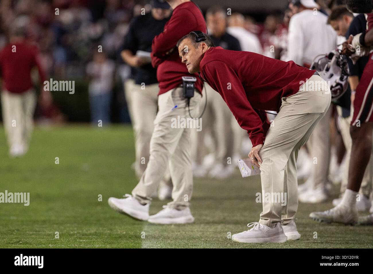 South Carolina head coach Shane Beamer rests on his knees during the ...
