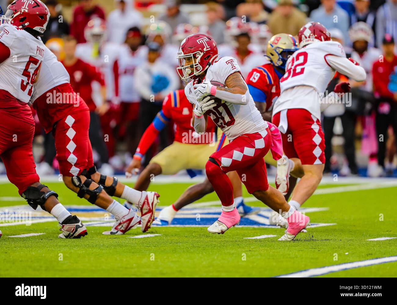 October 25, 2025:.Temple Owls running back Jay Ducker (20) runs with ...