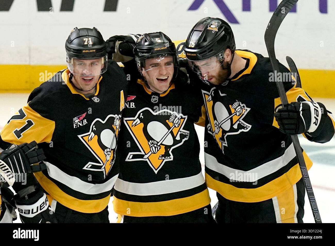 Pittsburgh Penguins' Ryan Shea (5) celebrates with Evgeni Malkin (71 ...