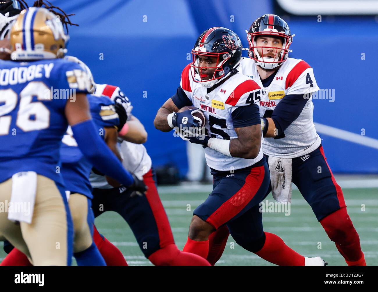 Montreal Alouettes quarterback McLeod Bethel-Thompson (4) hands off to ...