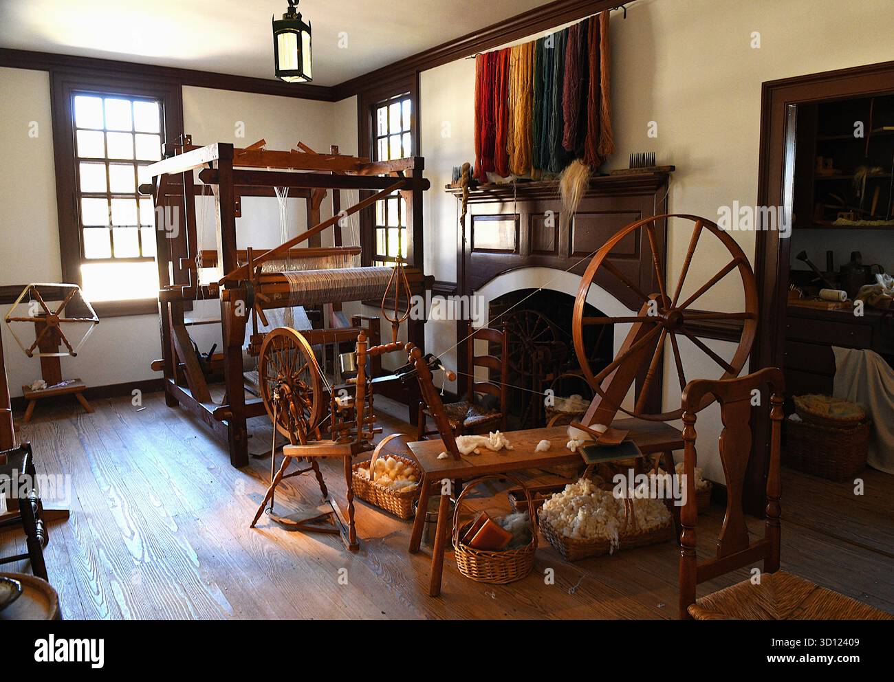 Loom and spinning wheels in storage Stock Photo - Alamy